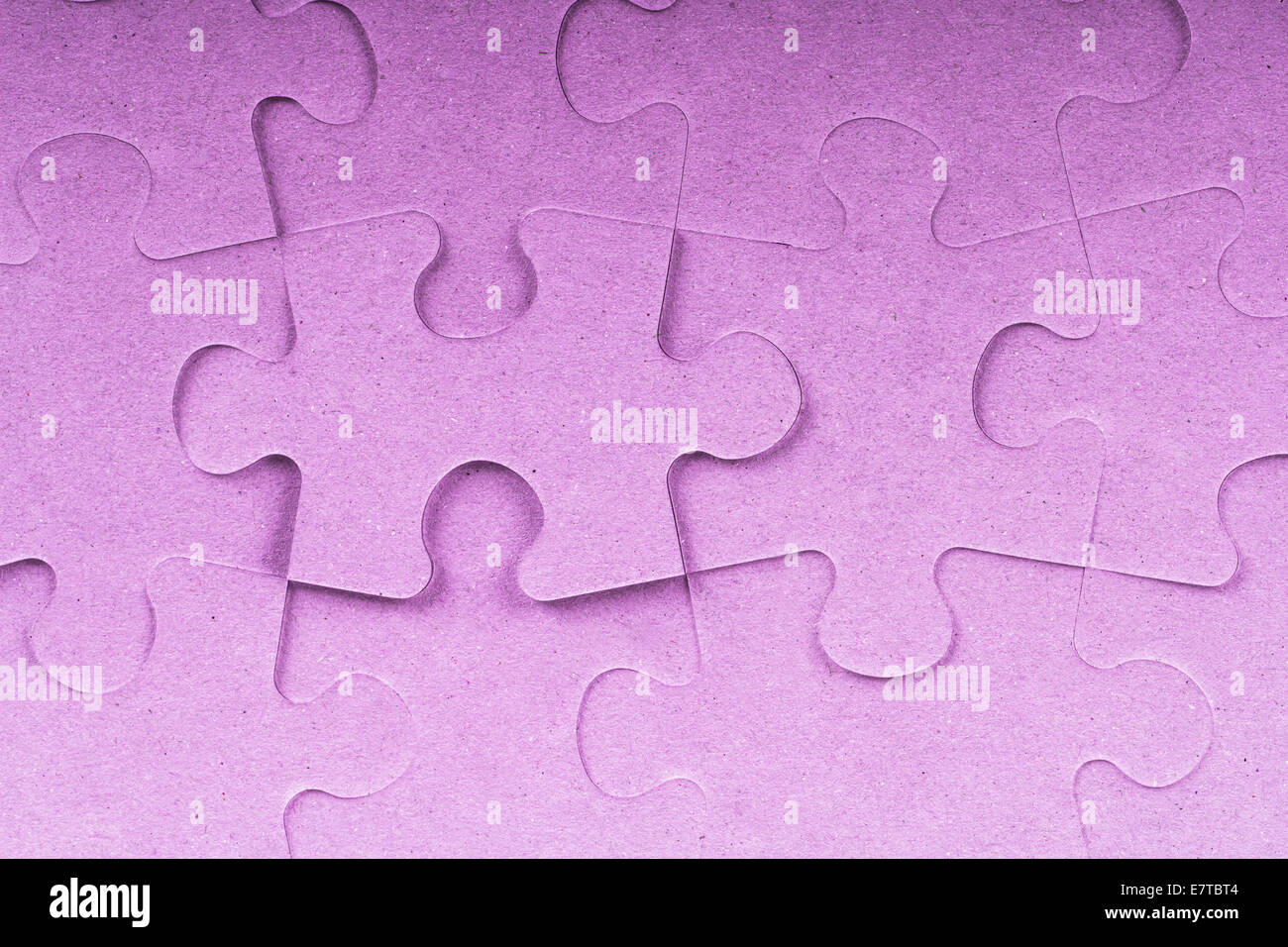 Pink complete puzzle pieces Stock Photo - Alamy