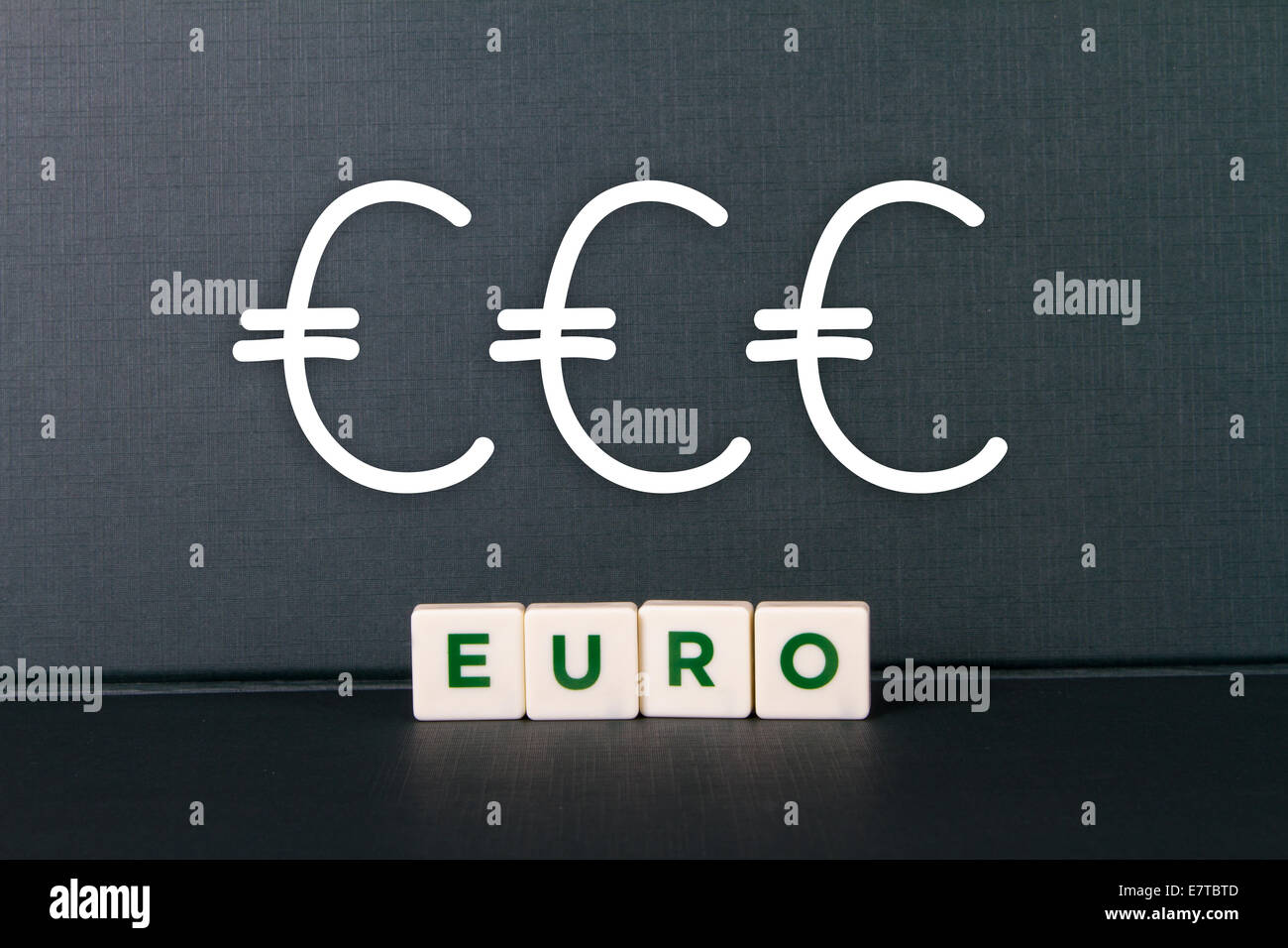 Finance concept, euro word in letters and financial symbol of money ...