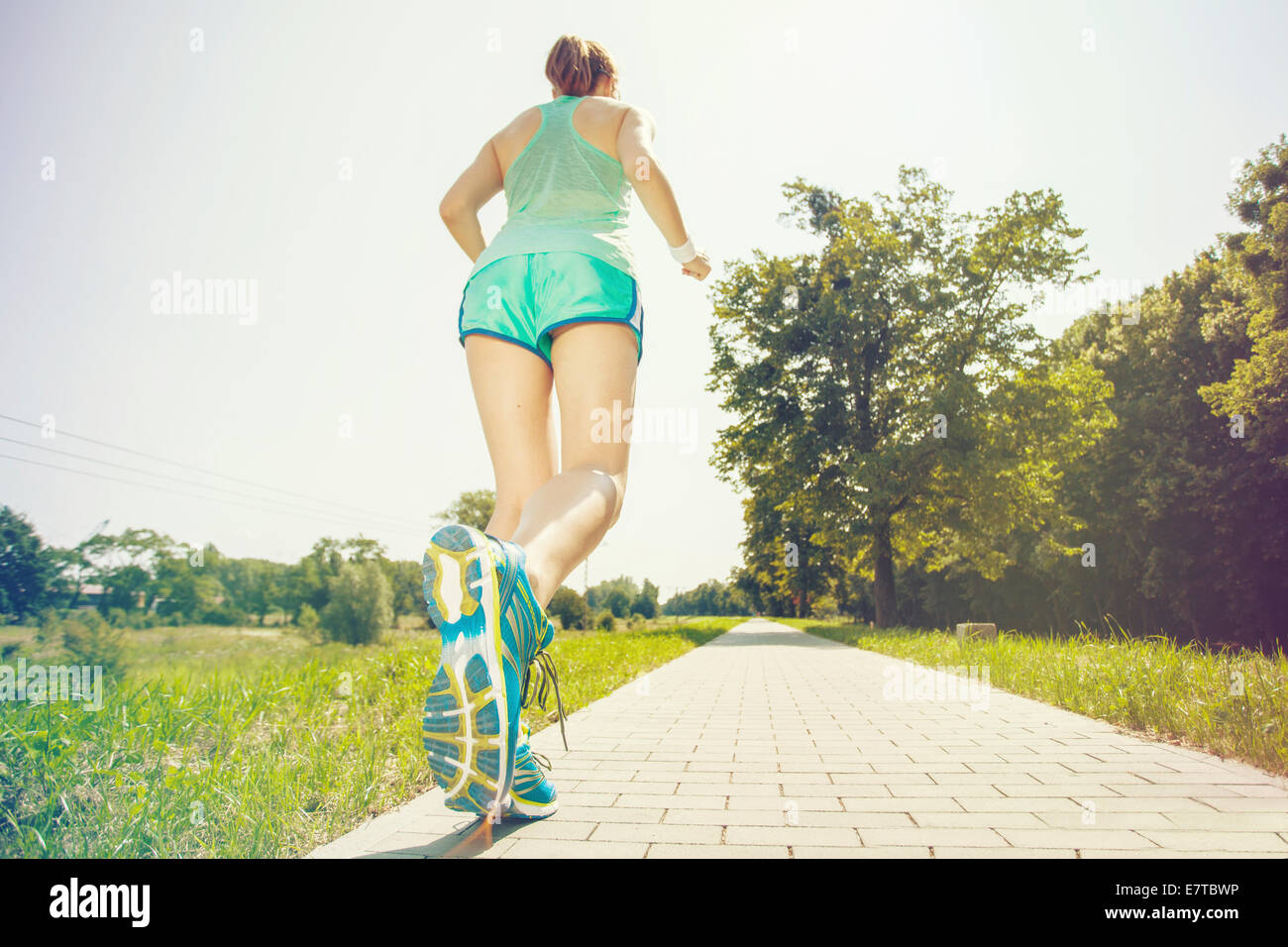 Two pretty girls jogging in the morning Stock Photo - Alamy
