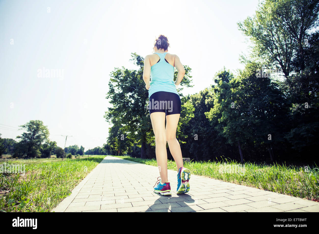 Two pretty girls jogging in the morning Stock Photo - Alamy