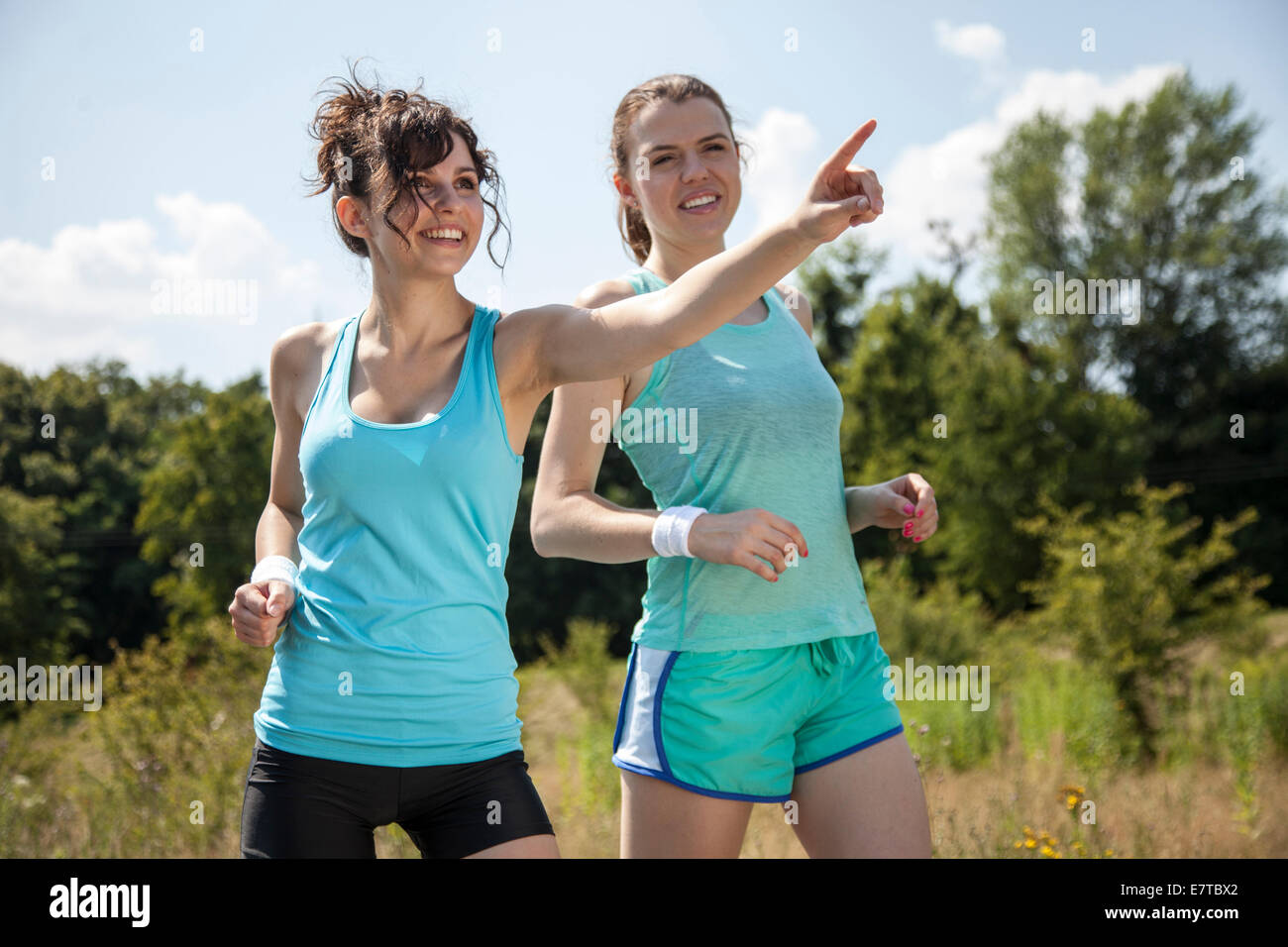 Two pretty girls jogging in the morning Stock Photo - Alamy