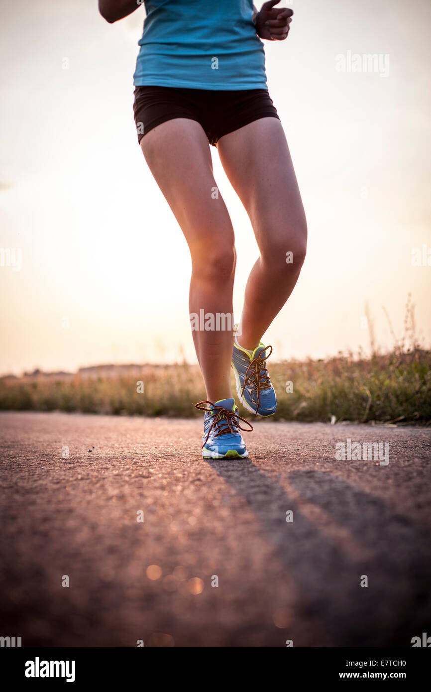 Two pretty girls jogging in the morning Stock Photo - Alamy