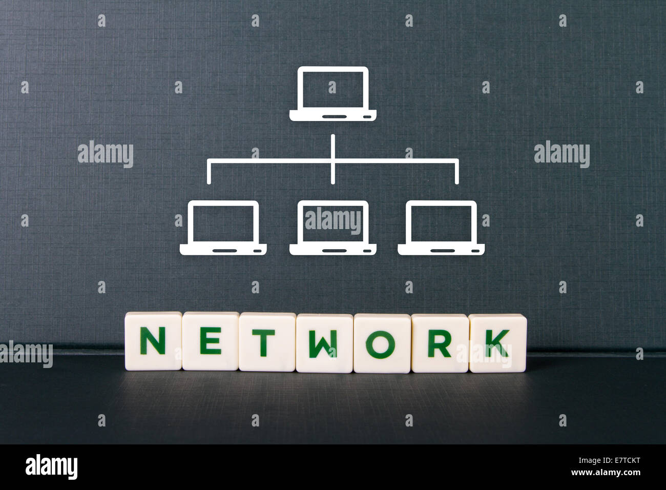 Network word in letters and laptop icons which are interconnected to ...