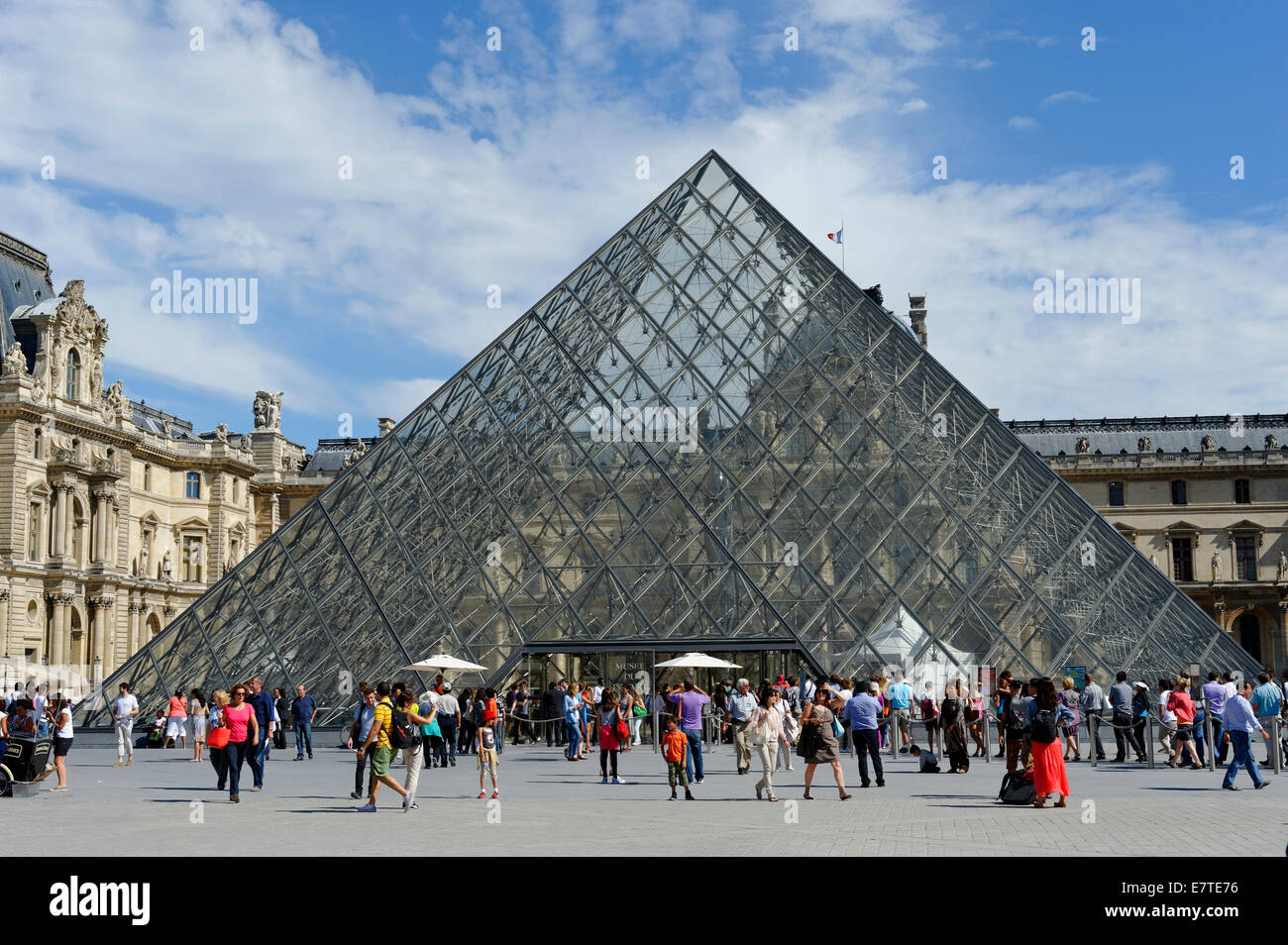 Louvre daytime pyramid hi-res stock photography and images - Alamy