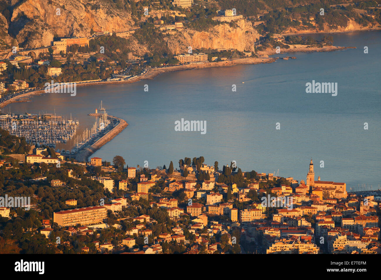 Menton with the port of Garavan and the border to Italy in the evening ...