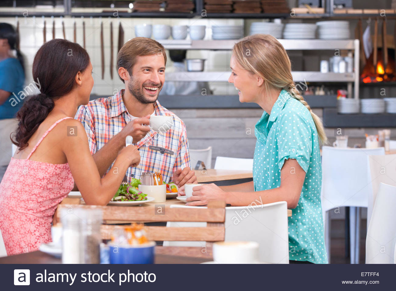 Women Laughing Restaurant Table Stock Photos & Women Laughing ...