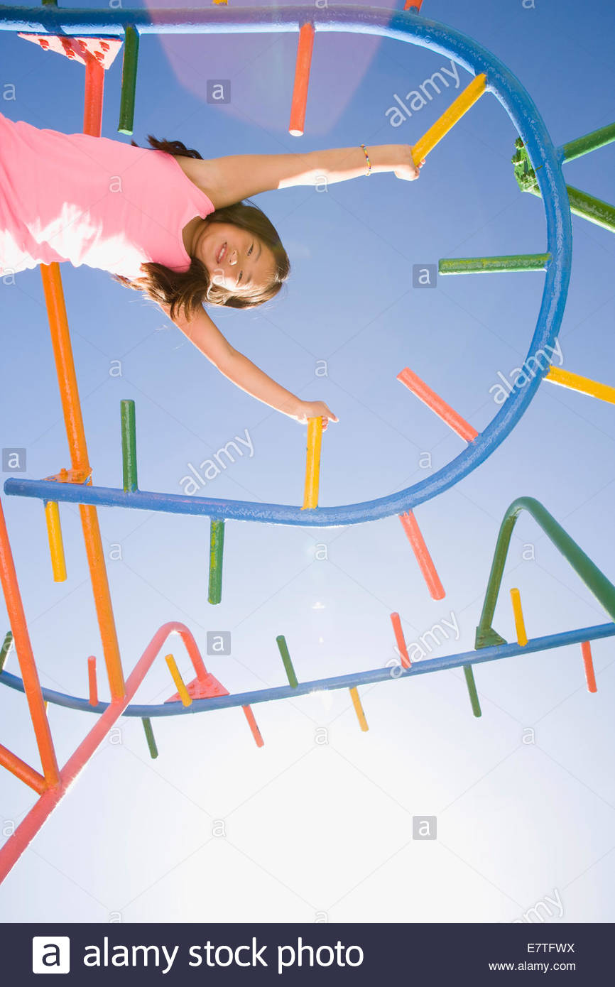 Girl On Playground Monkey Bars Stock Photos & Girl On Playground Monkey ...
