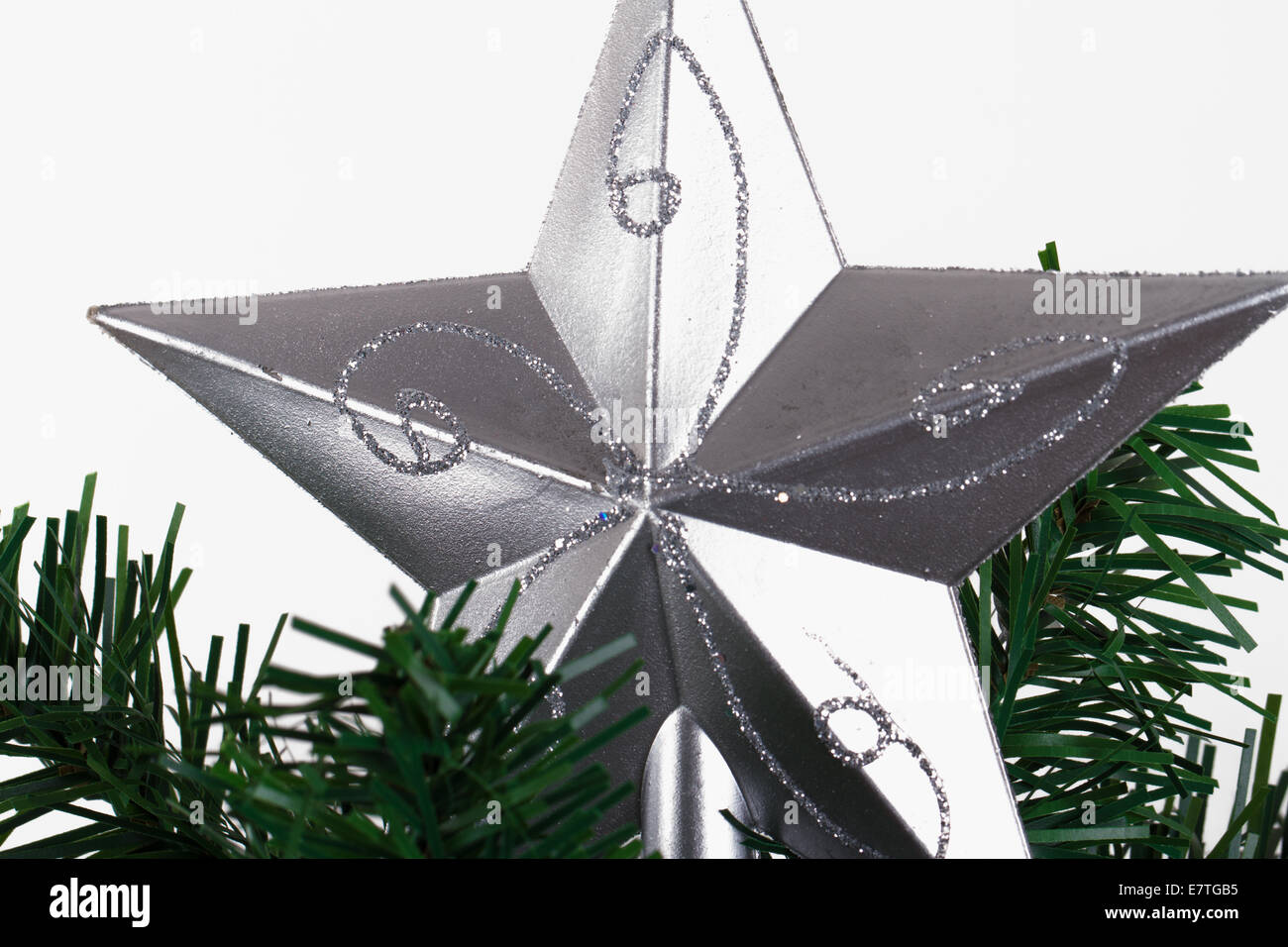 Christmas star on tree, isolated on white background Stock Photo - Alamy