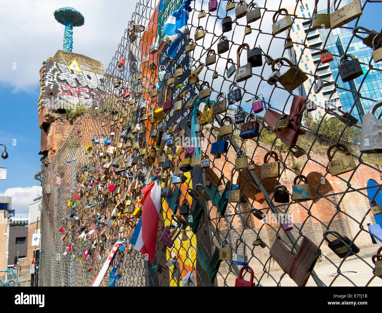 Guerilla art by Shoreditch High Street station, "love locks" and a ...