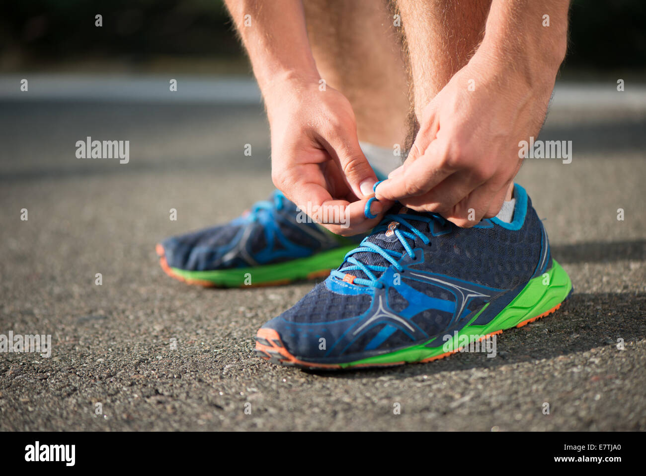 Runnning shoes on runner, close-up Stock Photo - Alamy