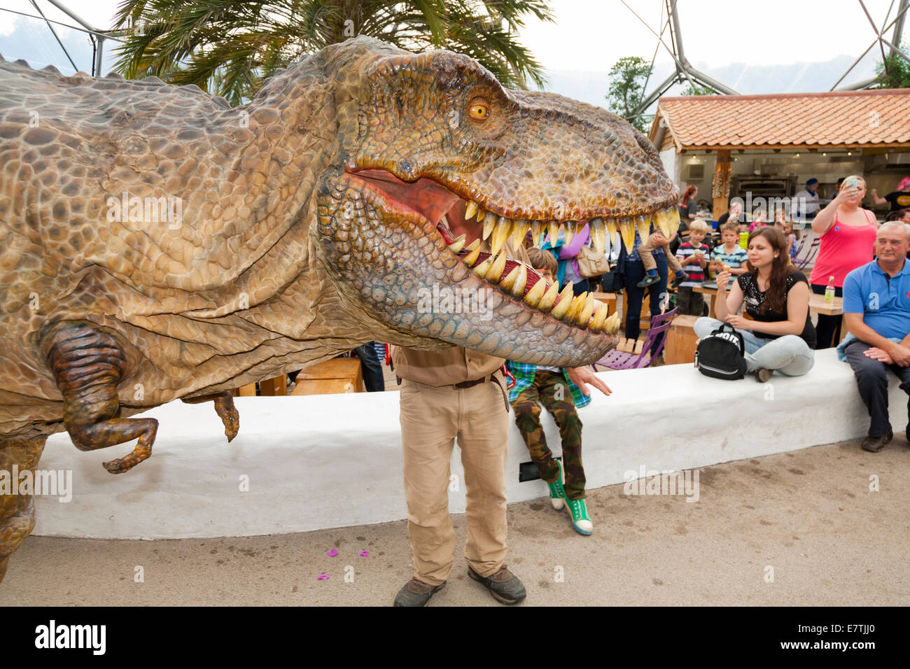 A Dinosaur on the loose (with guards) entertains children & families at ...