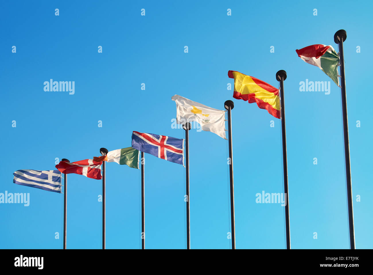 Row of european flags against blue sky background Stock Photo - Alamy