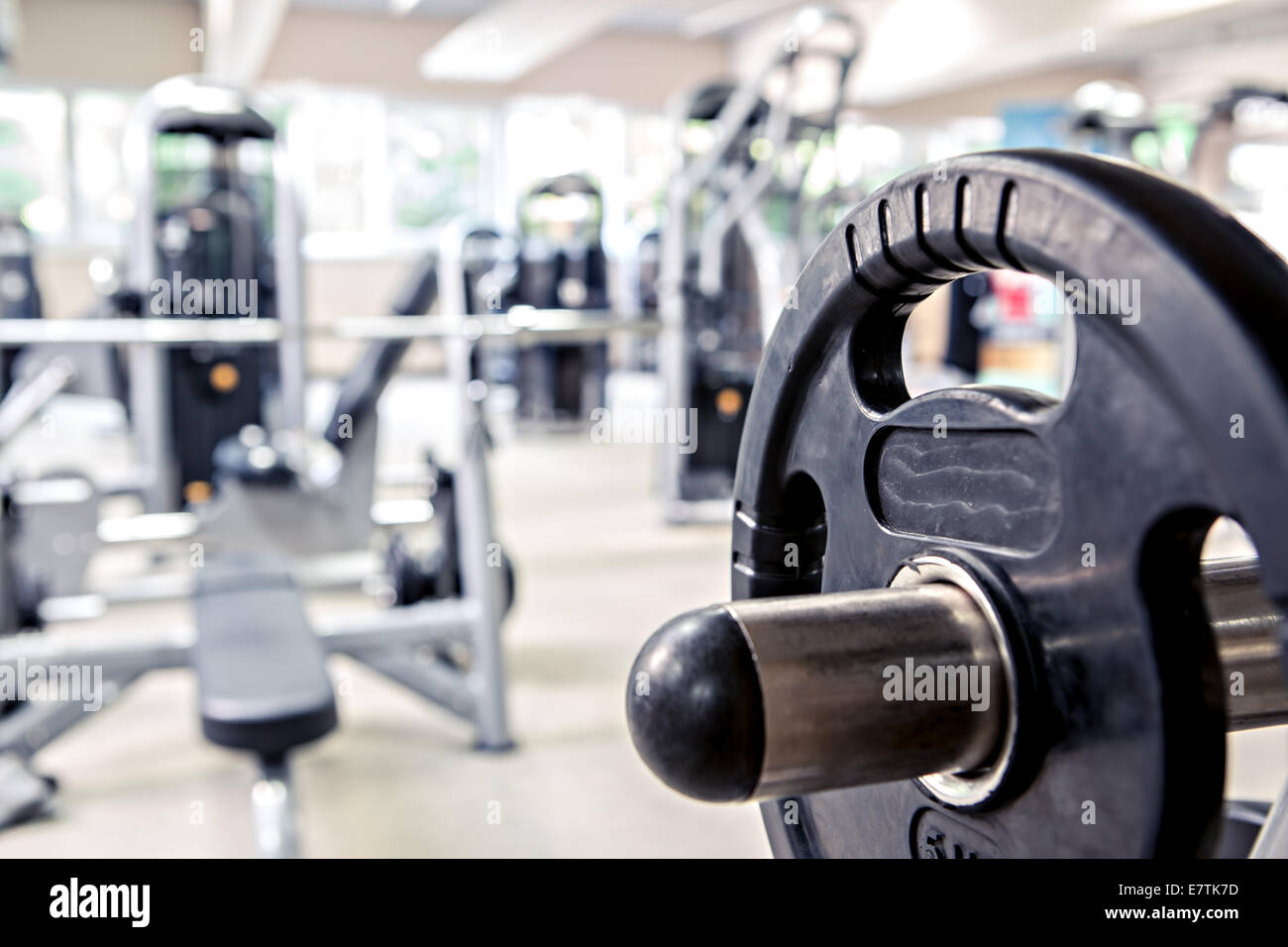 diverse equipment and machines at the gym room Stock Photo - Alamy