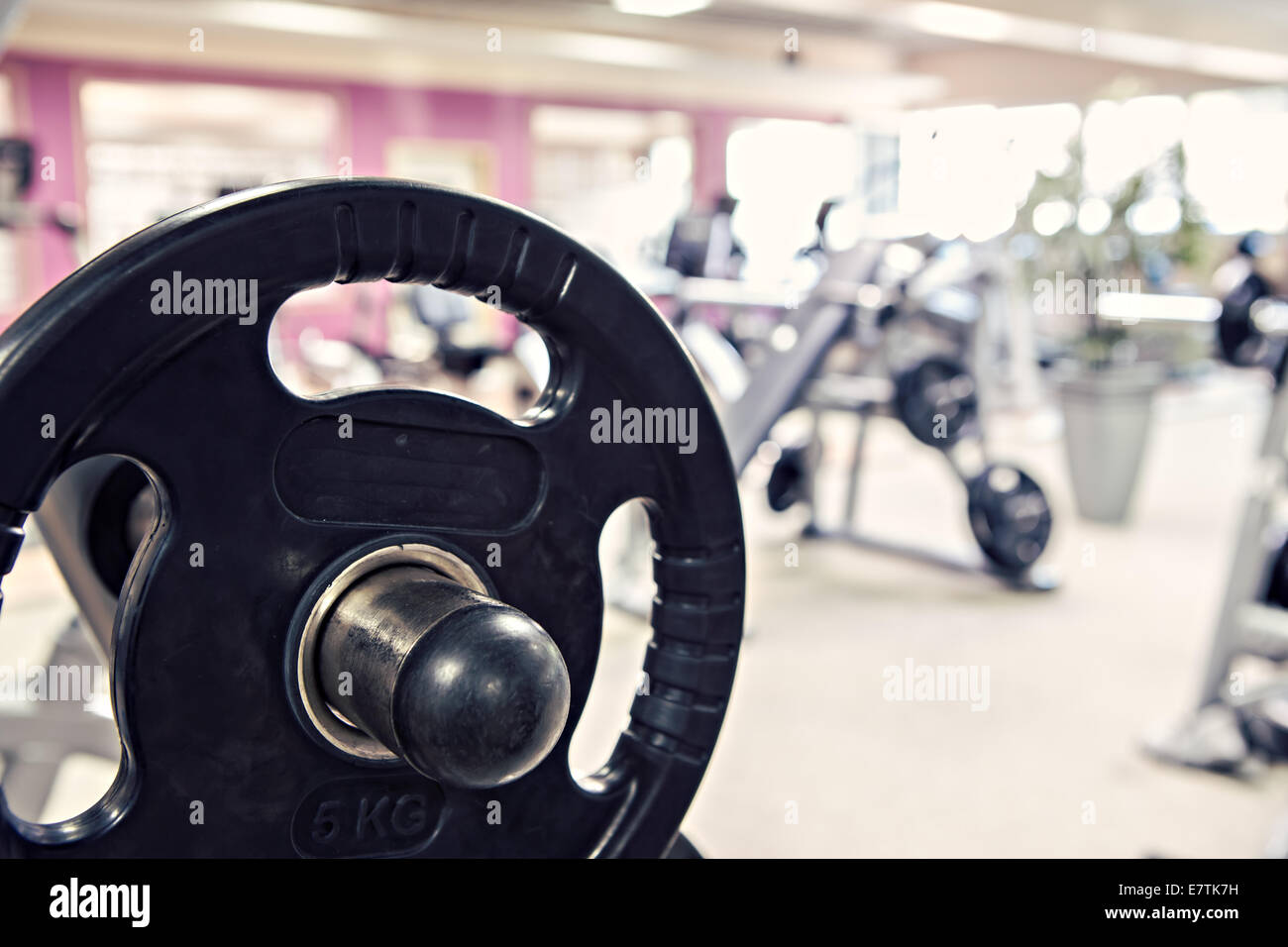diverse equipment and machines at the gym room Stock Photo - Alamy