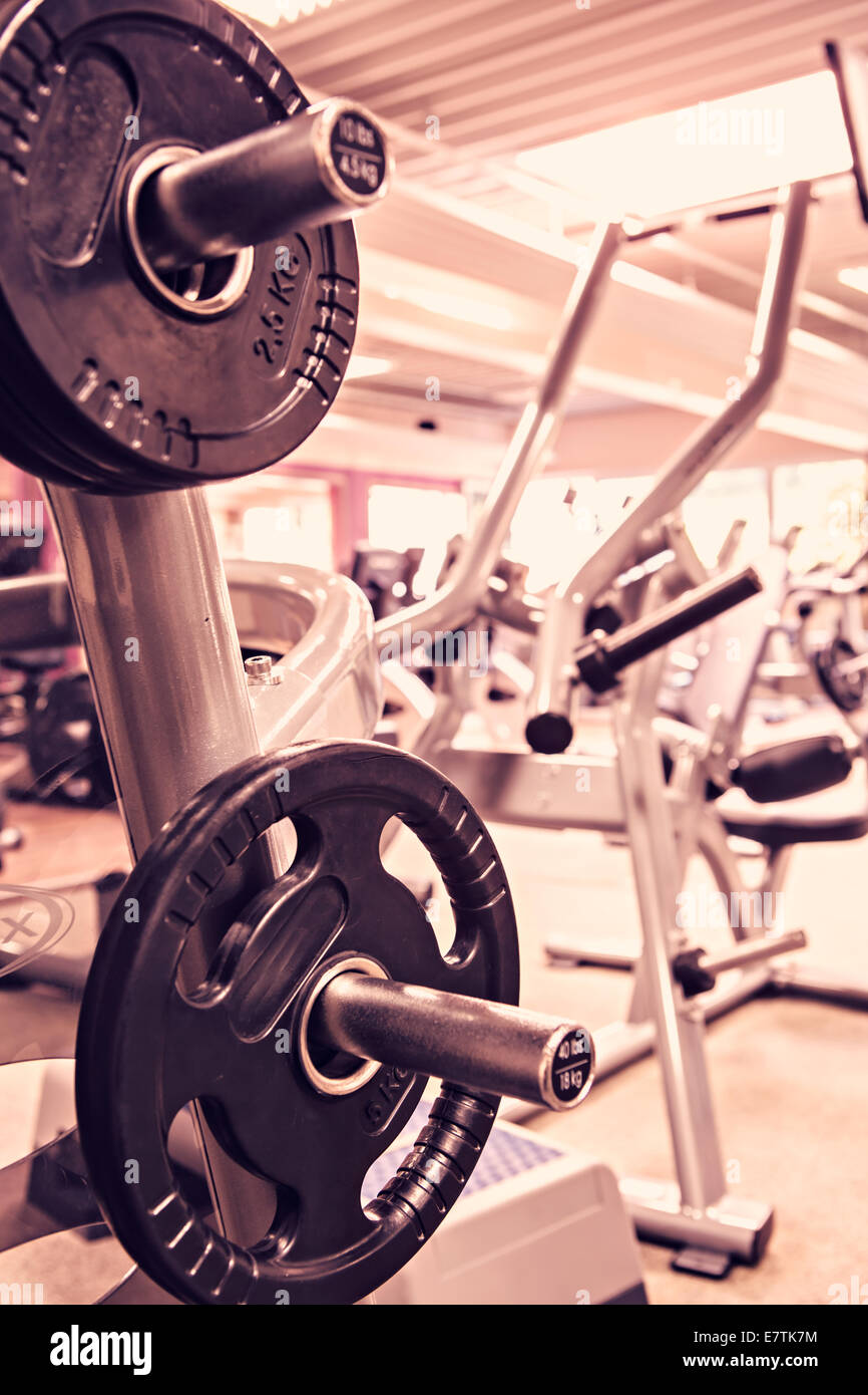 diverse equipment and machines at the gym room Stock Photo - Alamy