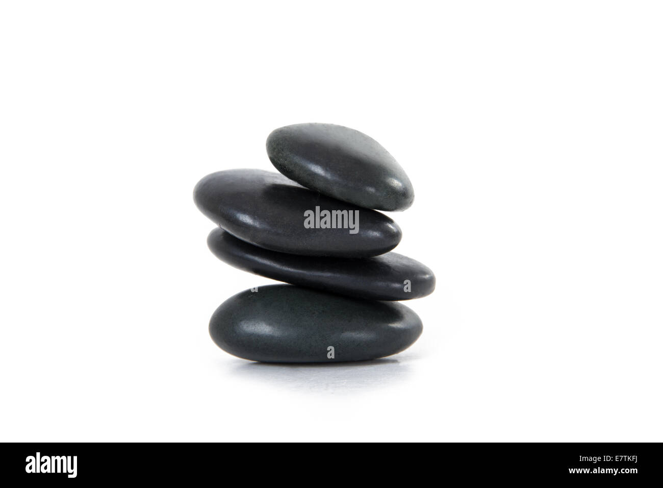 Four stacked stones hi-res stock photography and images - Alamy