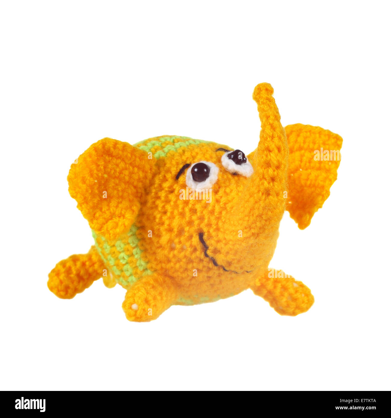 Knitted toy yellow elephant isolated on white background Stock Photo ...