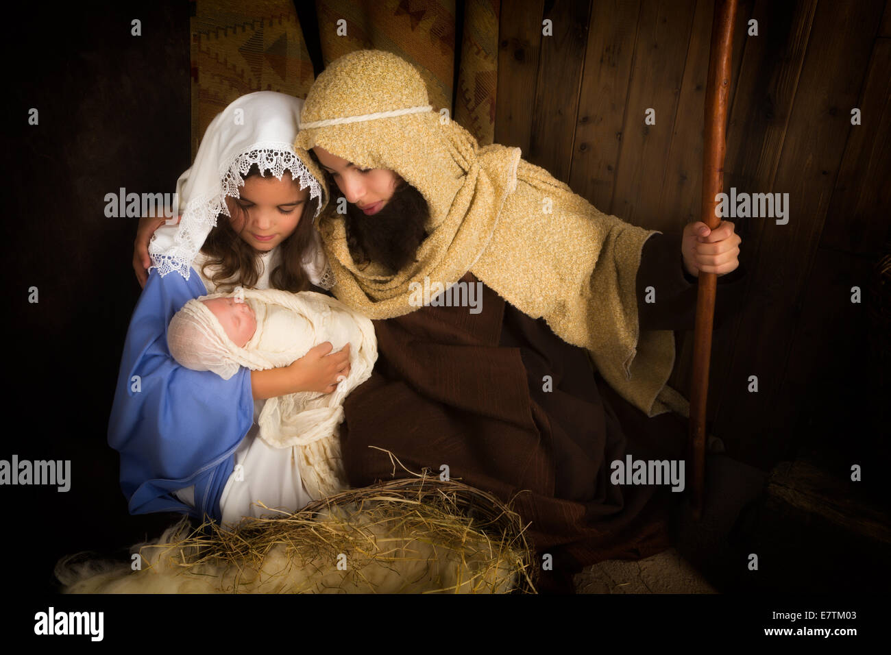 Christmas nativity scene reenacted by children and a doll Stock Photo ...