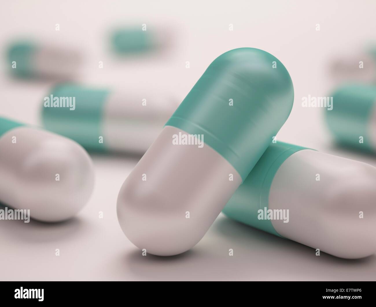 Green and white capsules, computer artwork Stock Photo - Alamy