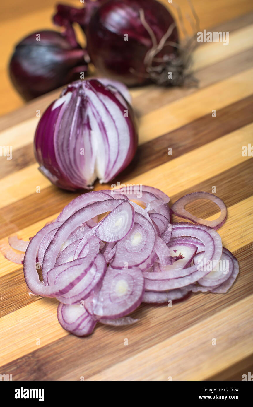 Chopped red onions on chopping board Stock Photo - Alamy