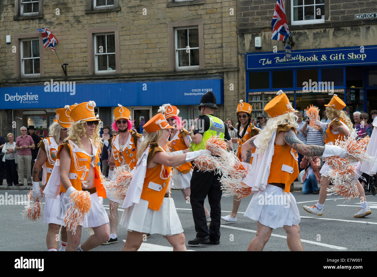 Men dancing round a policeman during the Bakewell Carnival Peak ...