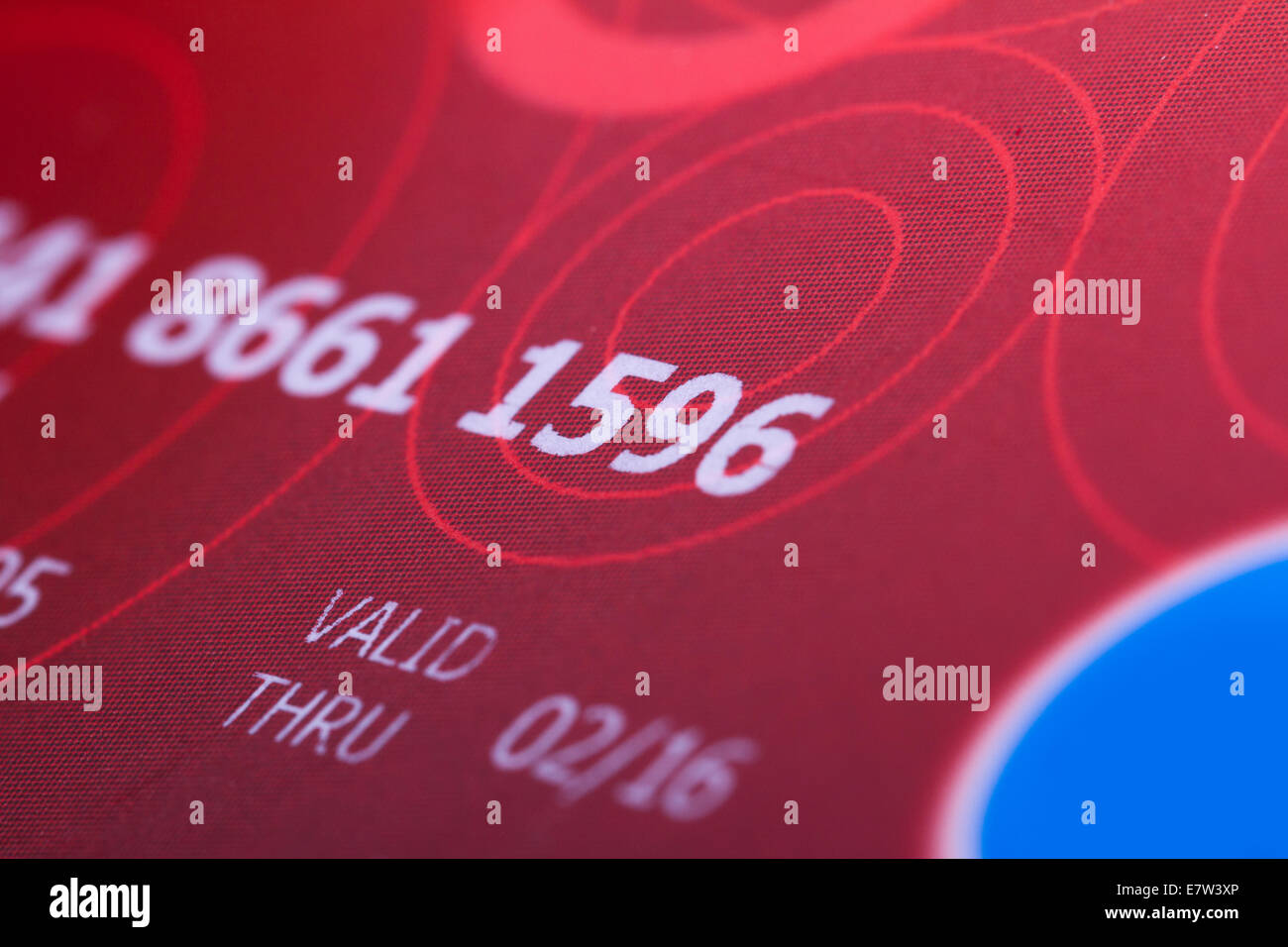 Close up of red credit card for shopping with numbers Stock Photo - Alamy