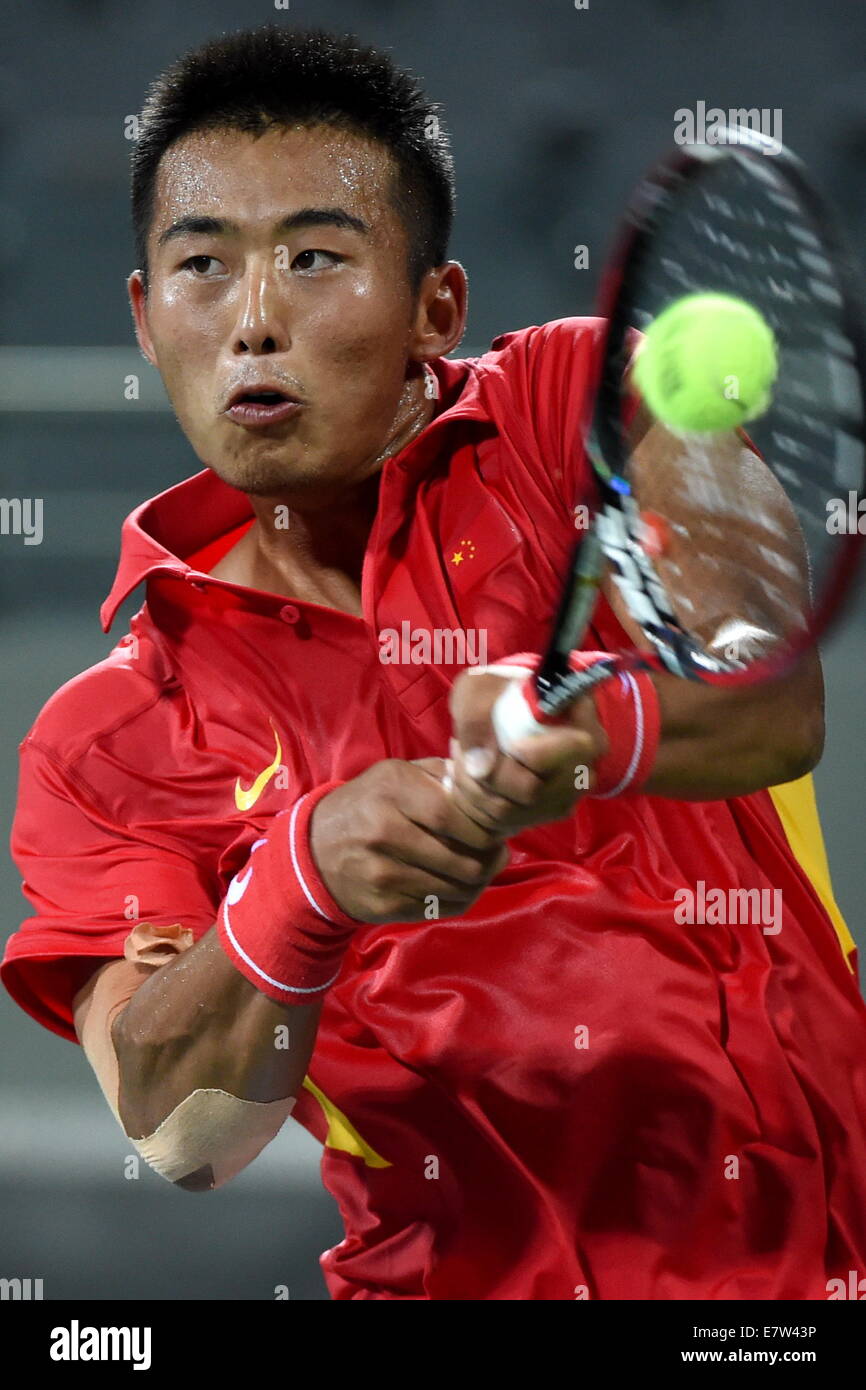 Incheon, South Korea. 24th Sep, 2014. Zhang Ze of China returns the ...