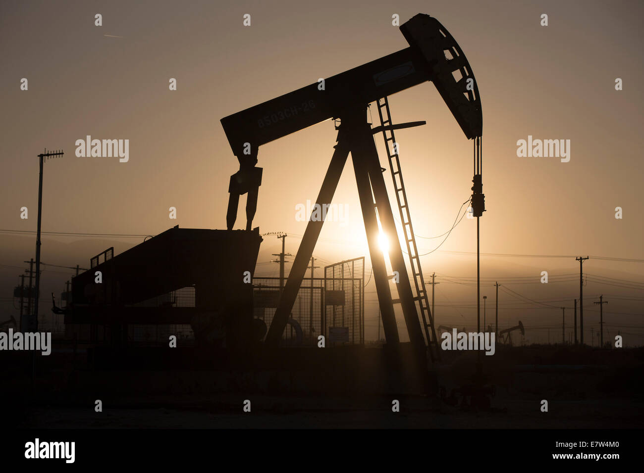 Pump Jack Silhouette at Sunset in California Stock Photo - Alamy