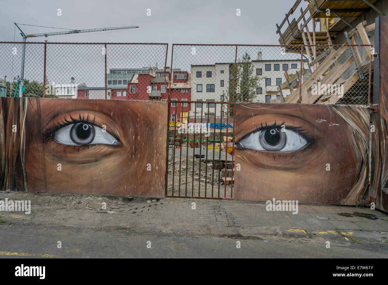Billboard of eyes on a fence. Construction site, Reykjavik Iceland ...