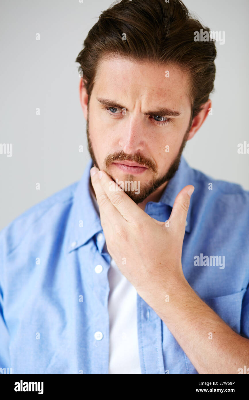 Worried confused man in hi-res stock photography and images - Alamy