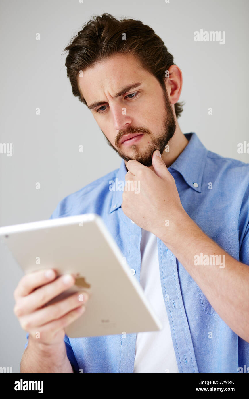 Worried confused man in hi-res stock photography and images - Alamy