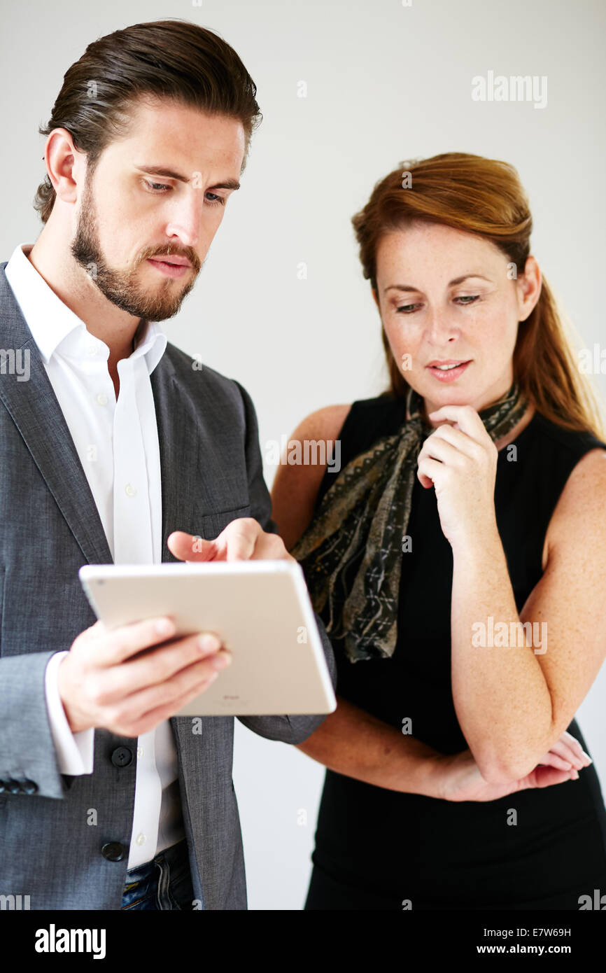 Two business people discussing work Stock Photo - Alamy Two business people discussing work Stock Photo - Alamy