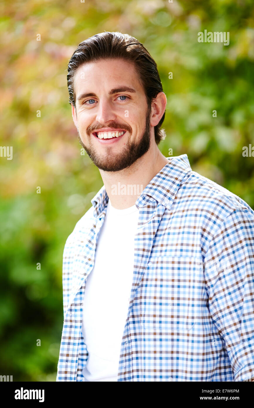 Portrait happy man standing outdoors hi-res stock photography and ...