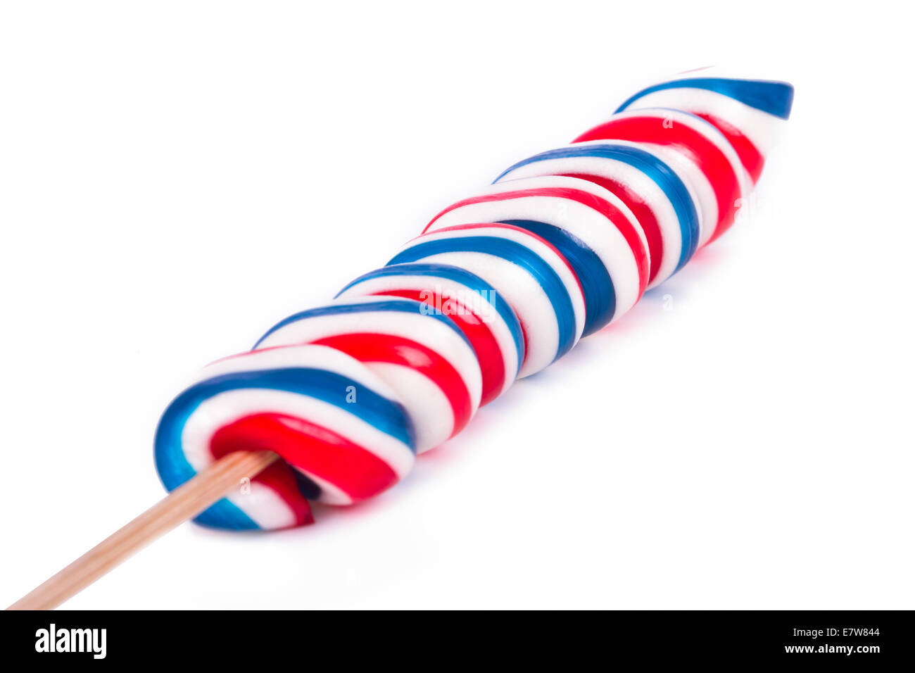 Colorful spiral lollipop candy on stick, isolated on white background ...