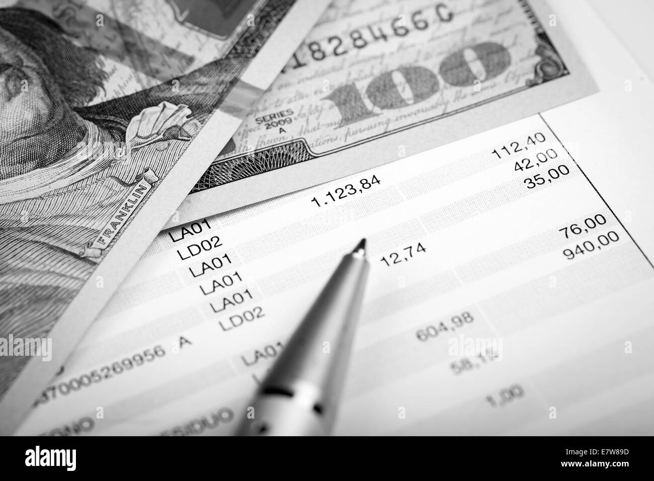 Business Photography: macro of dollars and loan plan Stock Photo - Alamy