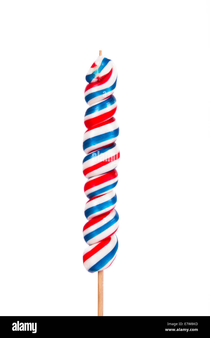 Colorful spiral lollipop candy on stick, isolated on white background ...