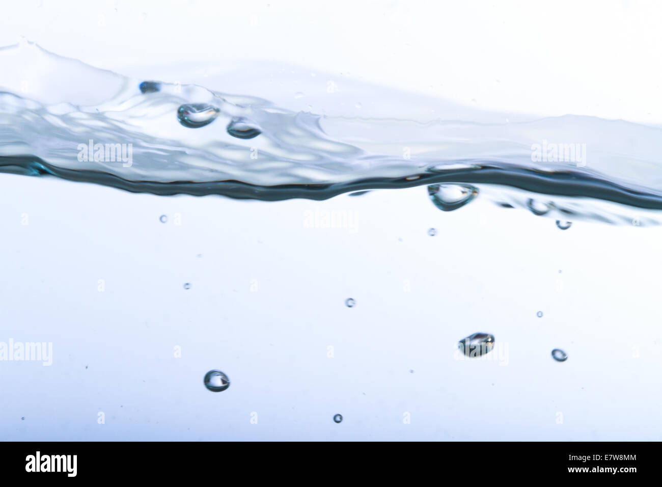 Close up view of water splash with big bubbles, isolated on white ...