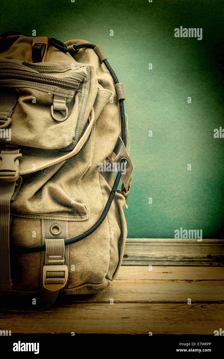 old travel backpack on the floor Stock Photo - Alamy
