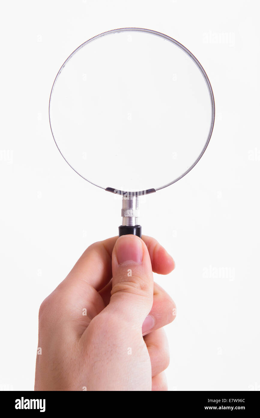 Hand holding classic style magnifying glass, isolated on white ...