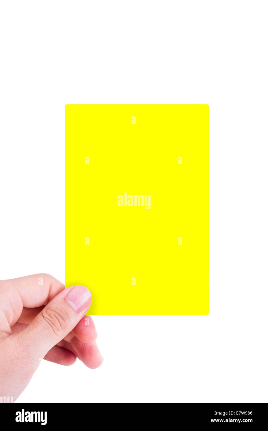 Hand holding yellow card, isolated on white background Stock Photo - Alamy