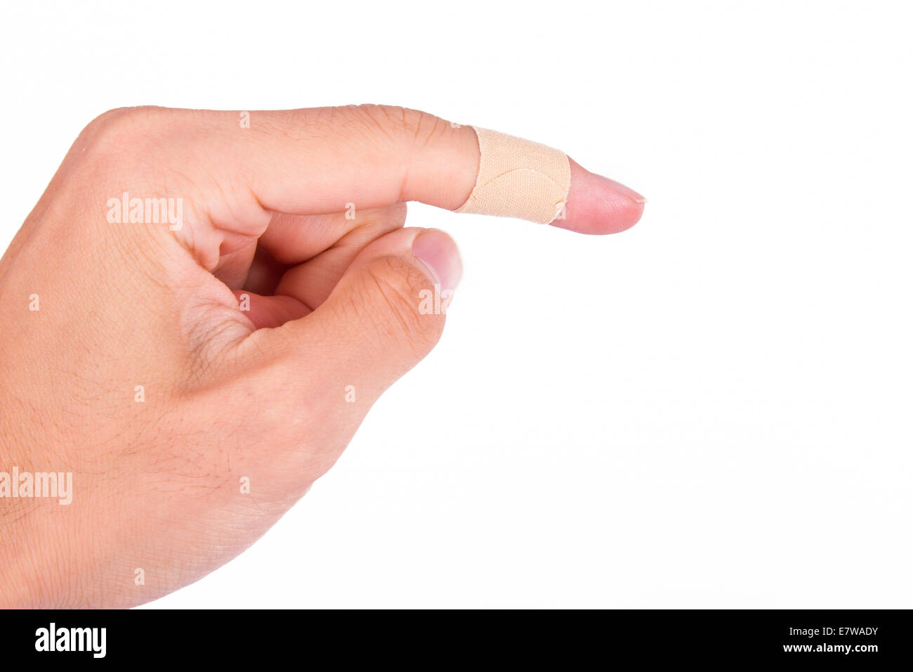 Adhesive bandage, plaster on index finger, isolated on white background ...