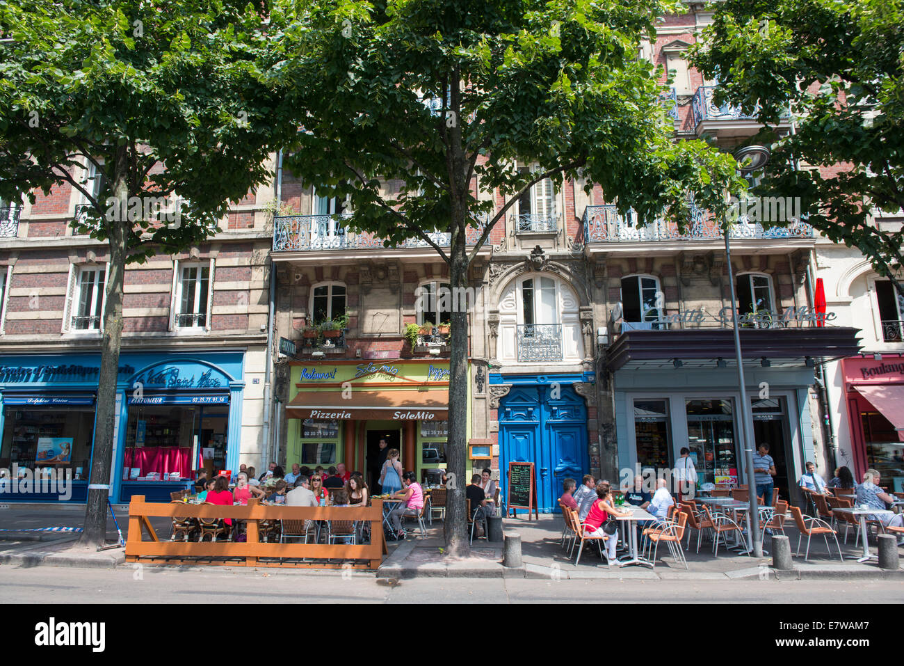 People sitting outside on a summer day in Rouen, France Europe Stock ...