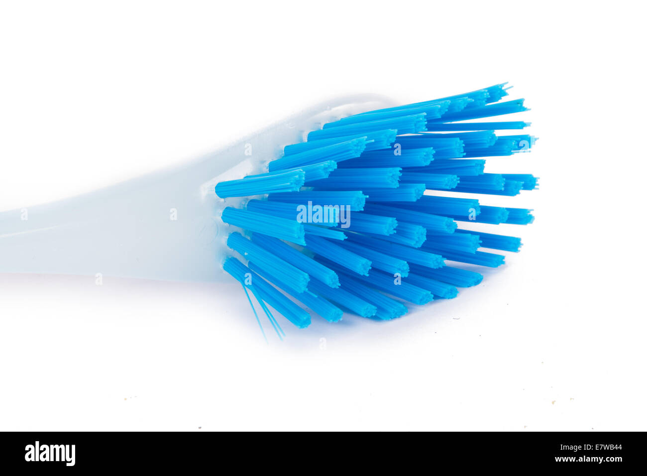 Blue brush for cleaning, isolated on white background Stock Photo - Alamy