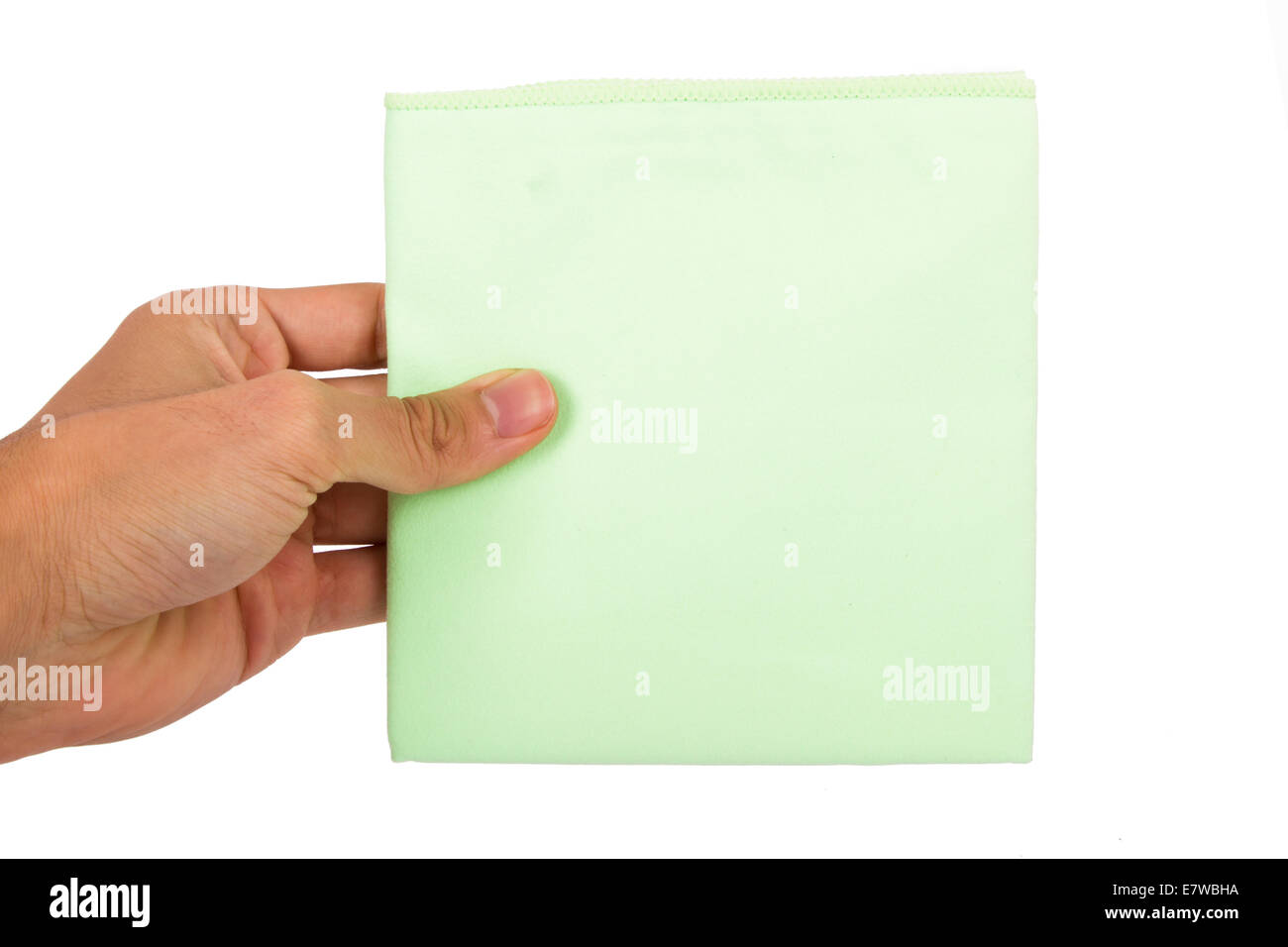 Hand holding green rag for cleaning, isolated on white background Stock ...
