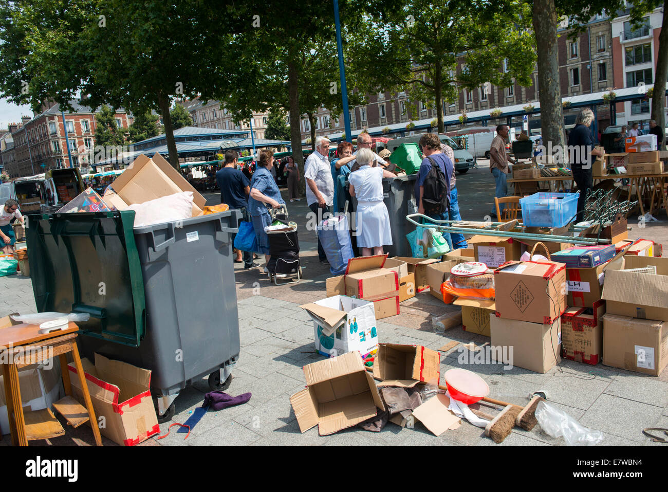 People looking through bins at a market in Rouen, France Europe Stock ...
