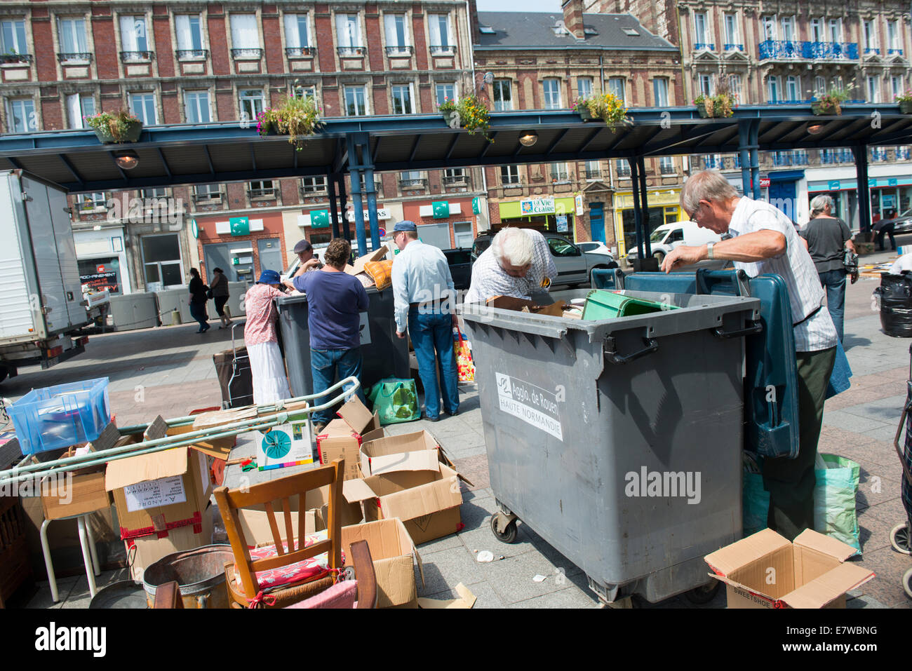 People looking through bins at a market in Rouen, France Europe Stock ...