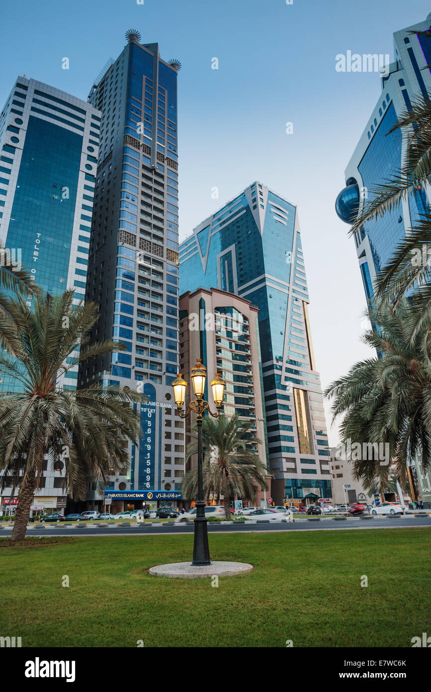 SHARJAH, UAE - OCTOBER 29, 2013: Modern buildings in Sharjah. It is the ...