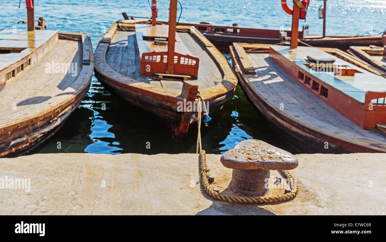 Traditional Abra boat at the pier in Dubai Stock Photo - Alamy
