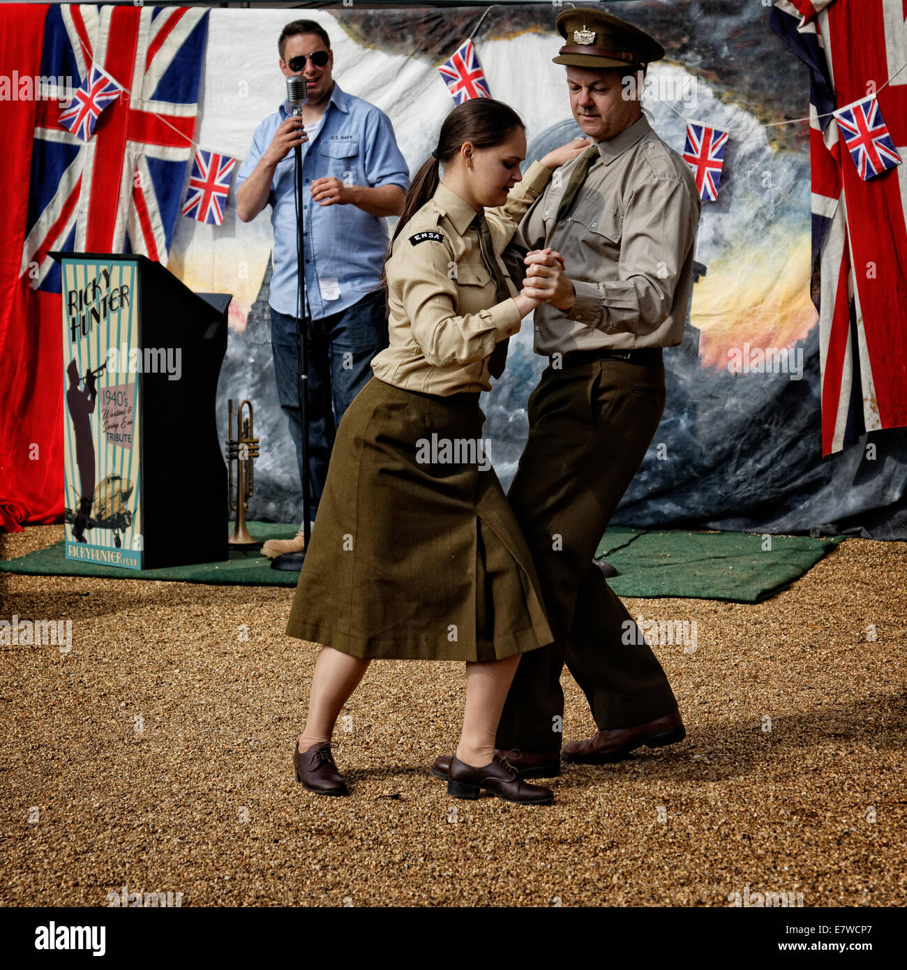 Ricky Hunter 1940s vocalist sings while members of ENSA (Entertainment ...