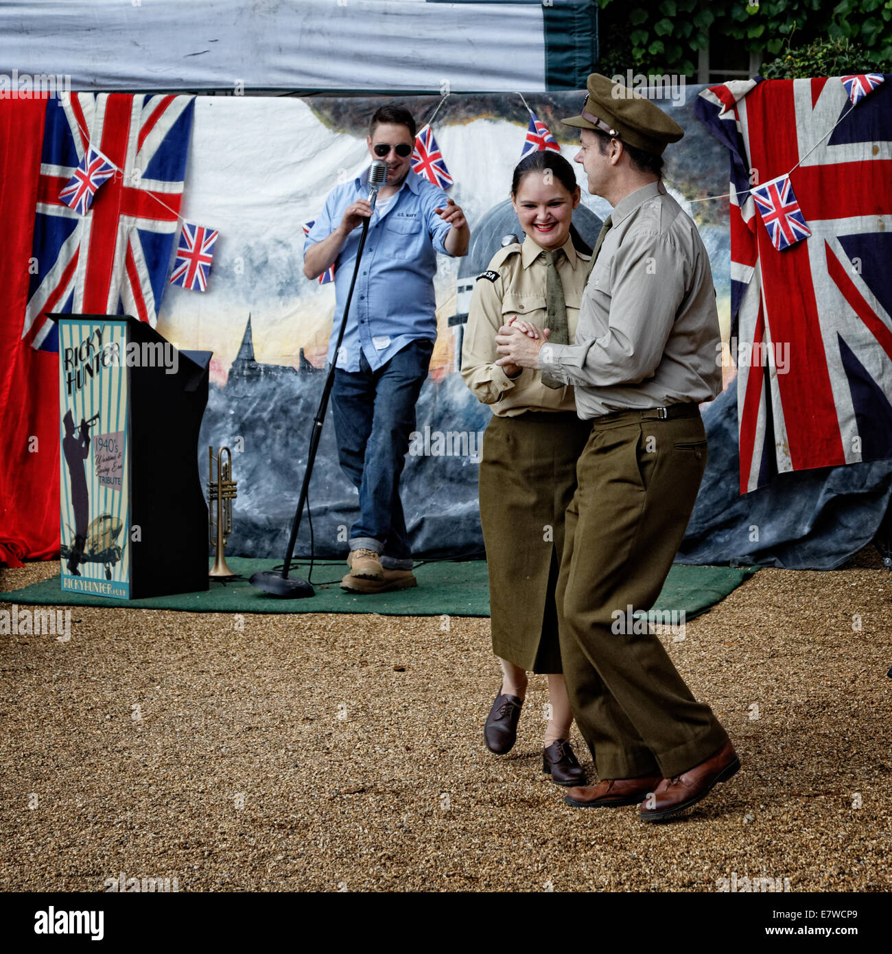 Ricky Hunter 1940s vocalist sings while members of ENSA (Entertainment ...